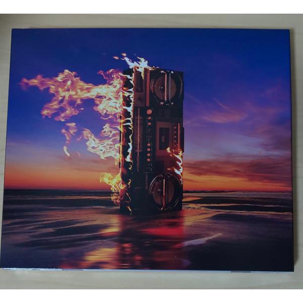 初回限定盤、バーミリオンレコード。収録曲（全形態共通）01. イルミネーション（NHK連続テレビ小説「おむすび」主題歌）02. 鞭（ABEMAオリジナルドラマ「インフォーマ -闇を生きる獣たち-」主題歌）03. The IIIRD Eye（...