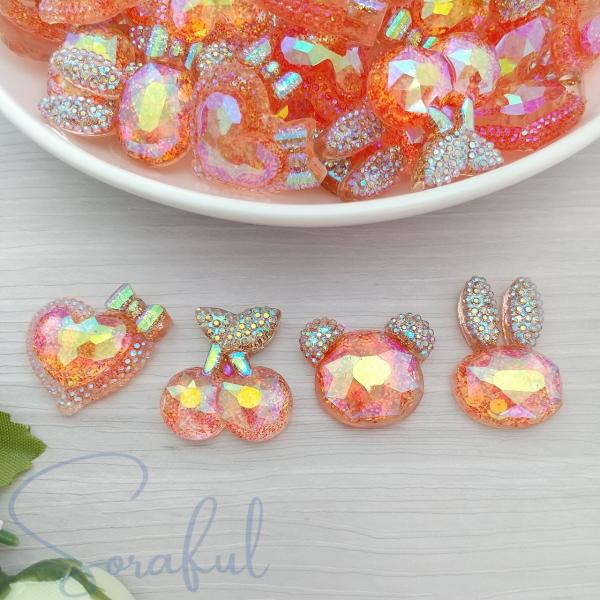 デコパーツ クリアレッド キラキラ ラメ 多面カット クリスタル 4個 貼付けパーツ D-0553