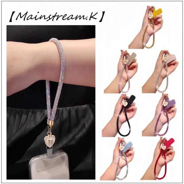 26-R029このキラキラと輝くスマホショルダーストラップは、スマートフォンを安全かつスタイリッシュに持ち運ぶための必需品です。挟み込みチップ付きで、ケースなしでもスマートフォンに簡単に取り付けられ、落下防止に役立ちます。腕に掛けることで両...