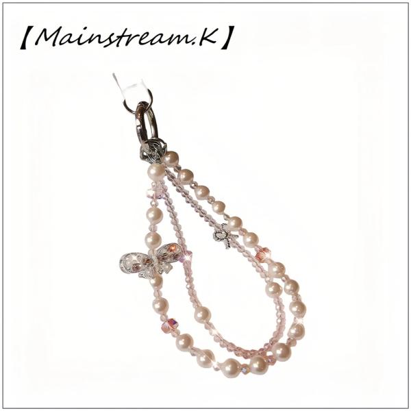 26-R030このスマホショルダーストラップは、機能性とファッション性を兼ね備えた必須アイテムです。キラキラと輝くパールやビーズをあしらったデザインは、日常使いから特別な日まで幅広いシーンで活躍します。3つの異なる柄からお選びいただけるので...