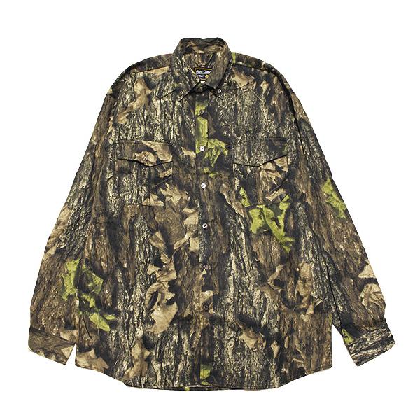 人気のリアルツリー柄を使用した長袖シャツ。ポリエステル素材を混合した中肉厚なコットンツイル地に両胸はポケットを配したボタンダウンシャツ。ゆったりとしたオーバーサイズシルエットに仕上げ、パーカー、トレーナー等の上からでも羽織れるライトアウター...