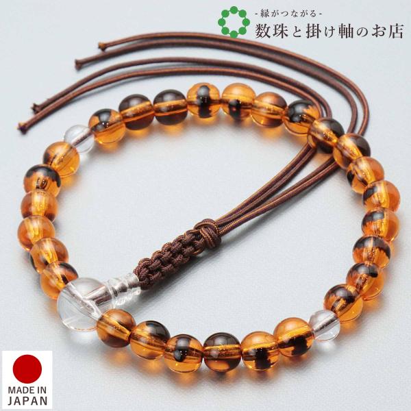 「スタンダードなカタチの略式数珠」略式数珠、片手数珠と呼ばれるものはどの宗派でもご使用いただけます。珠の大き目なものが男性用、小さめなものは女性用となっています。現在ではこの略式数珠を多くの方が持つようになり、定番の仏具アイテムです。落ち着...