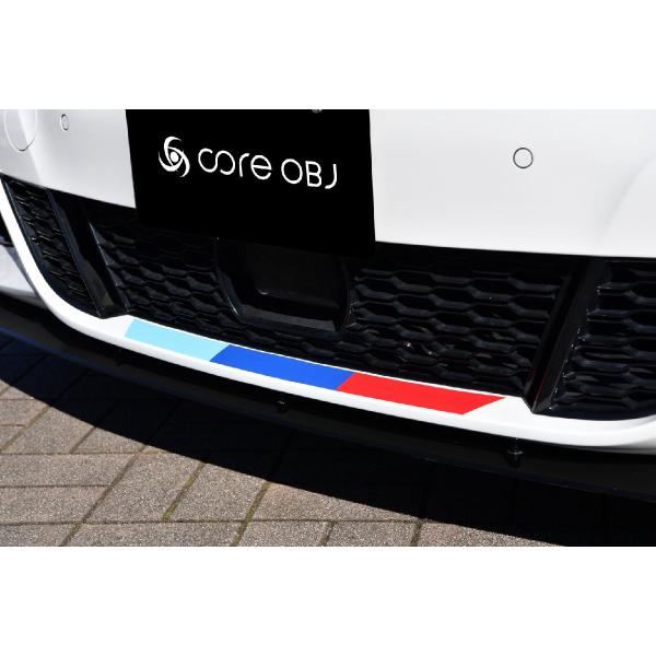 core OBJ Front Lip Spoiler Tricoroll Decal for BMWです。フロントリップに簡単に貼り付けられるトリコロールデカールです。BMW にワンポイントのアクセントを与えることができます。装着方法は同封...