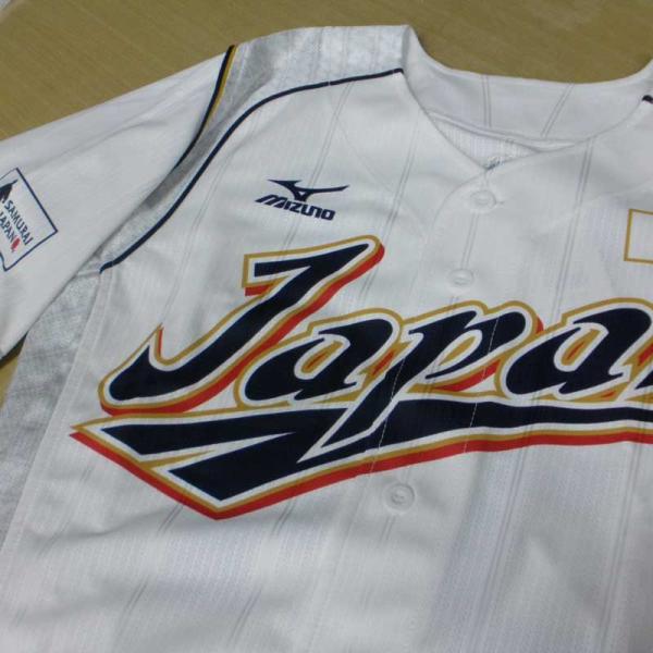 ※長野　久義　３４　Ｍサイズのみ在庫あります。すぐ発送できます。選手が着ているのとズバリ同じ！　商品説明●素材：ポリエステル100％●サイズ：Ｍ●カラー：ホワイト（ホーム用）　　　　　※こちらは右袖部分に「侍ジャパン」のロゴが入った2013...