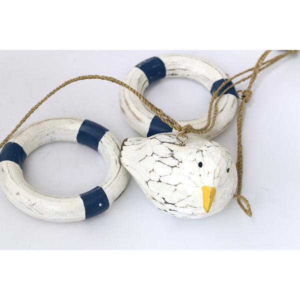 マリンなモチーフをあしらった木彫りのガーランド。お部屋の雰囲気をさわやかにしてくれます。サイズ：約TL95〜100cm※ネコポス発送NGです。配送方法を【ネコポス】に選択されても【宅急便】へ変更させて頂きます。