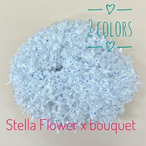 ＳＴＥＬＬＡの自信作大きな羽のひらひらとブーケが交互に入ります、ひらひらは星のドット入りです。当店を代表するフラッグヤーンです。引き揃え糸の素材、ハンドメイドの材料に最適です。もちろんそのままラッピング糸に使用してもおしゃれで目立つ事間違い...