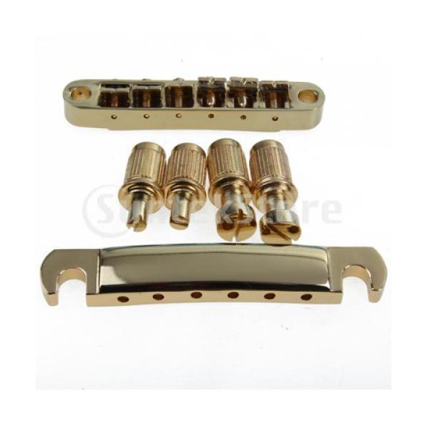 説明:ABR-1タイプ/ギターブリッジとテールピース「E」保持クリップ付きの個別のスロット付きサドル非常に高速で正確な個々の弦の高さのアクション調整と.正確な個々のイントネーションの調整が可能ですレスポールとギブソンのエレキギターに適してい...