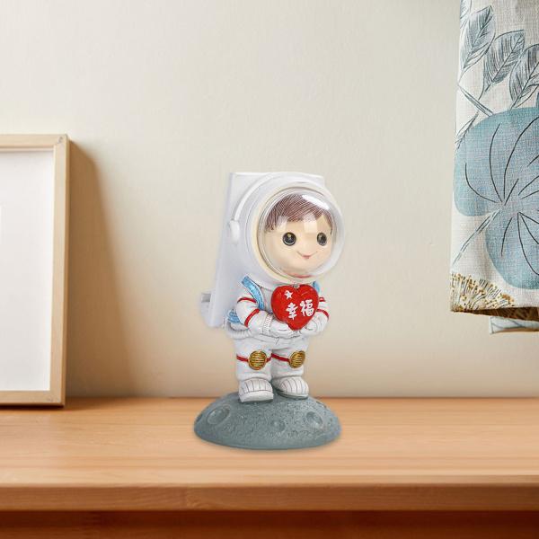 説明:素材:樹脂製.手描きと着色.環境にやさしい.滑らかな表面.耐久性.安定:電話の位置は.転倒や落下を防ぐのに十分安定しています.スマートフォンを水平または垂直に置くと.常に見晴らしが良くなります.ユニークなデザイン:月に立って携帯電話を...