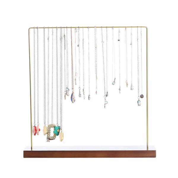 説明:素材: 木製ベースと防錆金属フレームで作られており.安定しており.頑丈で耐久性があります.精巧な職人技: シンプルでエレガントなモダンスタイルのネックレスディスプレイスタンド.あらゆる種類のイヤリングを際立たせるのに最適です.ジュエリ...