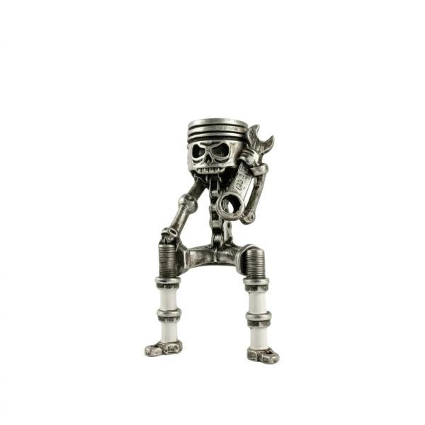 【ユニークなデザイン】: メタリックシルバーとダークなエイジング加工を施した、インダストリアルな機械調のガイコツロボットの置物です。【細部への追求】: ピストン風の頭部やレンチのディテール、中空のアイソケットなど、メカニカルな魅力が詰まった...