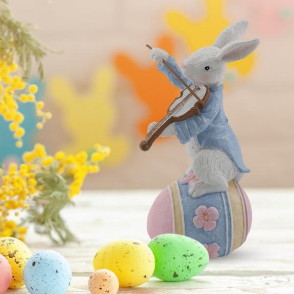説明:イースターバニー像:春のイースターバニー像は楽器を演奏し.繊細で美しいデザインで.特に毎年春に歓迎されます.クリエイティブでユニークなデザイン: このウサギはイースターエッグの上に立って楽器を演奏しており.ご自宅を春に向けて魅力的で華...