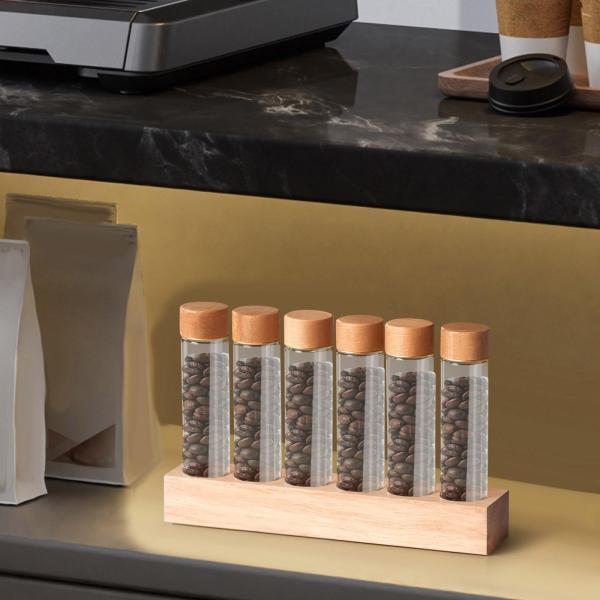 説明:[多機能]: コーヒー豆.花茶.ドライフルーツ.お茶.粗飼料などを入れる多機能ガラス試験管密閉収納ラック. [材質]: 密閉蓋付きの密閉ガラス管.ガラス製.透明で目に見える. [特徴]: 木製の収納ラック付きのコーヒー豆ディスペンサー...