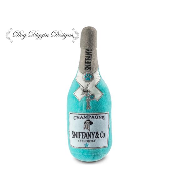 ☆ペットとペットを愛する人の生活を美しくスタイリッシュに提供するDog Diggin Designs。某有名ブランドをパロディしたデザインのシャンパン型おもちゃ。柔らかい起毛素材、鳴り笛入りです♪サイズ：約7.5cm
