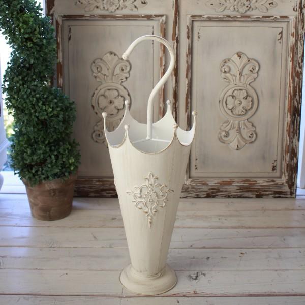 [商品説明]傘のデザインが可愛いアイアン製の傘立てアンティークペイント仕上げに中央には紋章がデザインされていますホワイトカラーにシャビーな雰囲気のおしゃれな傘立てはお玄関を明るく華やかにします上部３か所には仕切りがあり、傘を分けて収納して頂...