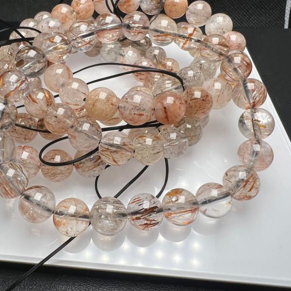 ランダム発送１連37-38cm分腕周り16cmブレスレット2本お届け鉱物名フォリエテェットマイカインクォーツ水晶にマイカ(雲母)がブラウンやブラック、ブロンズの針がルチルのように光りの反射で美しいメタリックな輝きを放ち、深い癒しのエネルギー...