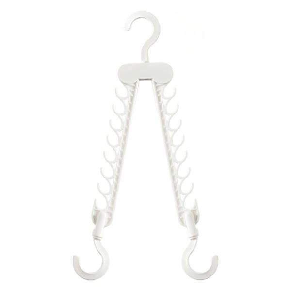 折りたたみハンガーホルダー省スペースに使える折りたたみハンガーホルダー。半分に折りたたみが出来るので、収納スペースを立体的に活用できます。16箇所でしっかりホールドすることができます。各フック部は回転するのでお気に入りの衣類をすぐに見つけ出...