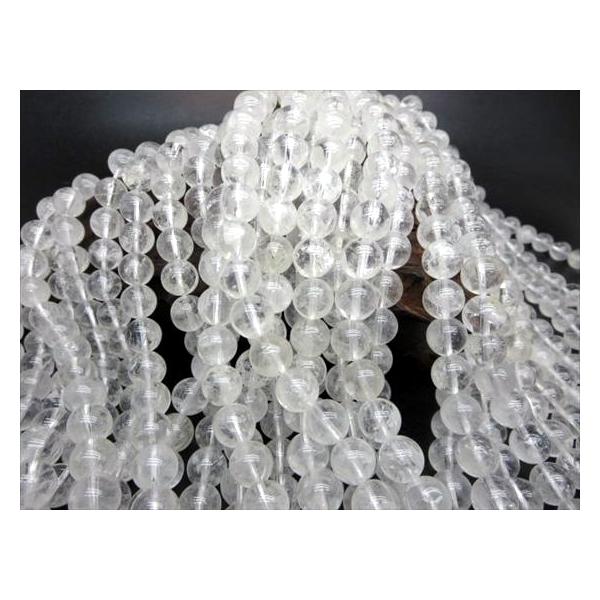 【連売り商品】ヒマラヤ水晶☆商品情報☆石サイズ：Φ10.5〜11.8mm　穴サイズ：約Φ0.8mm粒数：約35粒一連：約37cm原産地：ネパール・ガネーシュヒマール※形状やサイズのばらつき、表面や穴周りのキズや凹み等が目立ちます。粒数はあく...