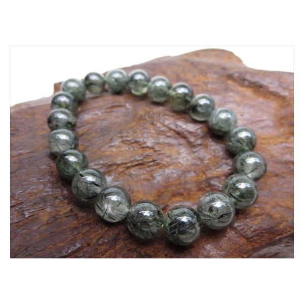 【ブレスレット】グリーンルチルクォーツ☆商品情報☆石サイズ：Φ9.5±0.5mm粒数：20粒重さ：約22.5g手首周り：約16cm原産地：ブラジル※材質により表面にキズや凹み等がございます。※形状やサイズのばらつき、表面や穴周りにキズや凹み...