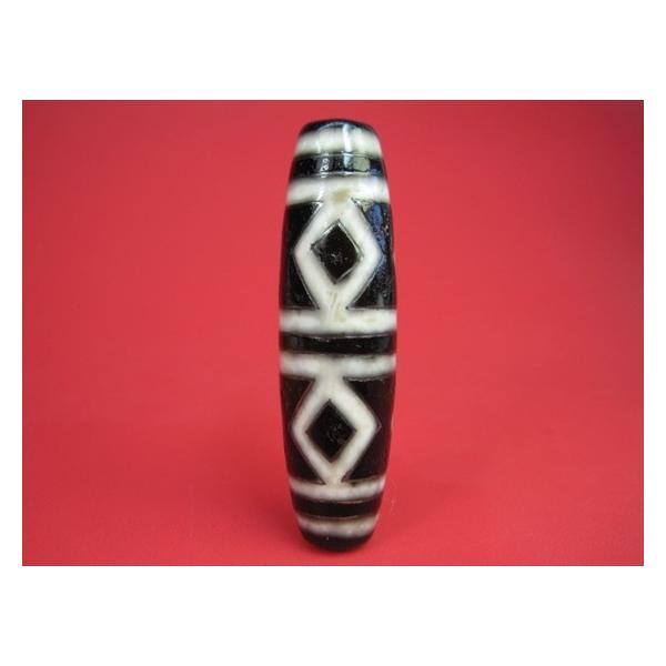 【チベット銀線天珠】金剛杵天珠☆商品情報☆長さ：約57mm直径：約Φ16mm穴サイズ：約Φ3mm中国・チベット天珠※照明等の関係で実際の色と多少イメージが異なる場合がありますのでご了承ください。※こちらは一点物ですので、画像の商品のお届けと...