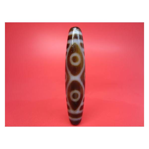 【チベット風化天珠】龍眼天珠☆商品情報☆長さ：約58mm直径：約Φ12mm穴サイズ：約Φ2mm中国・チベット天珠※照明等の関係で実際の色とは多少イメージが異なる場合がありますのでご了承ください。※こちらは一点物ですので、画像の商品のお届けと...