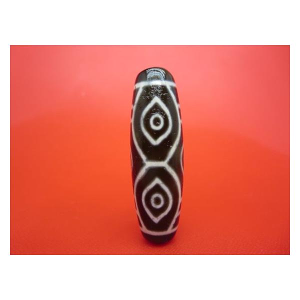 【チベット風化天珠】☆商品情報☆長さ：約50mm直径：約Φ15mm穴サイズ：約Φ2.8mm中国・チベット天珠※照明等の関係で実際の色とは多少イメージが異なる場合がありますのでご了承ください。※こちらは一点物ですので、画像の商品のお届けとなり...