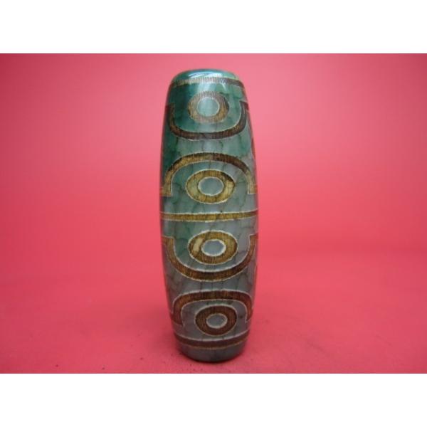 【チベット天珠】十二眼天珠商品情報長さ：約40mm直径：約Φ14mm穴サイズ：約Φ2.2mm中国・チベット天珠※照明等の関係で実際の色とは多少イメージが異なる場合もありますのでご了承ください。※こちらは一点物ですので、画像の商品のお届けとな...