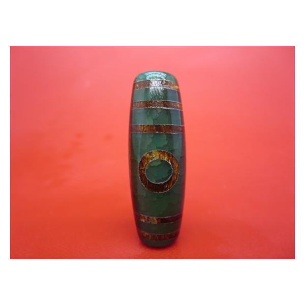 【チベット高級龍紋天珠】☆商品情報☆長さ：約40mm直径：約Φ14mm穴サイズ：約Φ2mm中国・チベット天珠※照明等の関係で実際の色と多少イメージが異なる場合がありますのでご了承ください。 ※こちらは一点物ですので、画像の商品のお届けとなり...