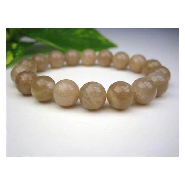 【ブレスレット】オレンジムーンストーン☆商品情報☆石サイズ：Φ10.2±0.2mm粒数：18粒重さ：約27g手首周り：約16.5cm原産地：マダガスカル※形状やサイズのばらつき、表面や穴周りにキズや凹み等があります。また、クラックやインクル...