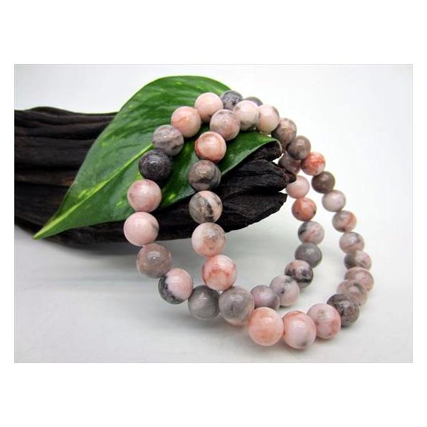 【均一ブレスレット】ピンクゼブラジャスパー（着色）☆商品情報☆石サイズ：Φ8.2±0.2mm粒数：23粒手首周り：約16.5cm※表面や穴周りのキズや凹み等が目立ちます。ご理解いただいた上ご注文下さいますようお願いいたします。※形状やサイズ...