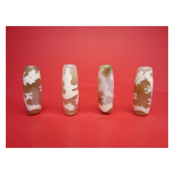 【チベット天珠】騎龍観音天珠☆商品情報☆長さ：29-30mm直径：Φ10-11mm穴サイズ：約Φ1.8mm中国・チベット天珠形状やサイズ、色味のばらつき、模様の滲み・ぼやけ・途切れ、表面や穴周りにキズや凹み等があります。穴が真っすぐでなかっ...