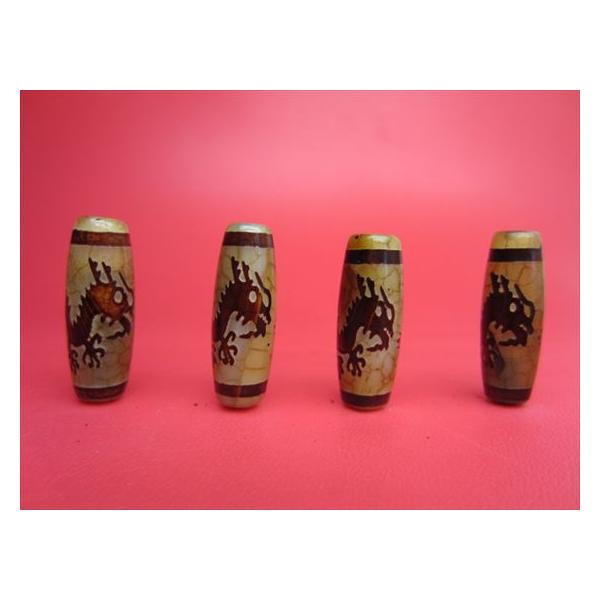 【チベット高級龍紋天珠】龍神天珠☆商品情報☆長さ：約30±1mm直径：約Φ10±1mm穴サイズ：約Φ2mm中国・チベット天珠※形状やサイズのばらつき、表面や穴周りにキズや凹み等があります。穴が真っすぐでなかったり、変形している場合があります...