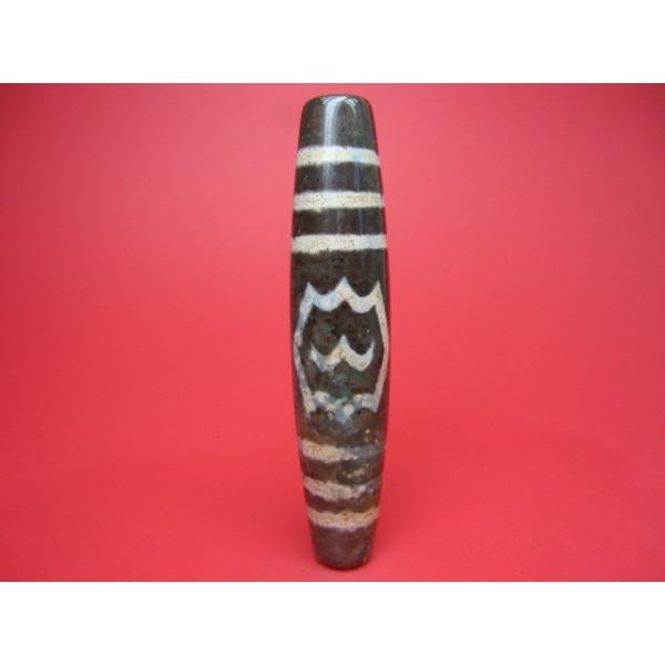 【大鵬鳥紅朱砂天珠】商品情報長さ：約79mm直径：約Φ17mm穴サイズ：約Φ2mm中国・チベット天珠※朱砂が肉眼では確認できない場合があります。※できるだけ実物と同じ感じになるように撮影をしておりますが、照明等の関係で実際の色と多少イメージ...