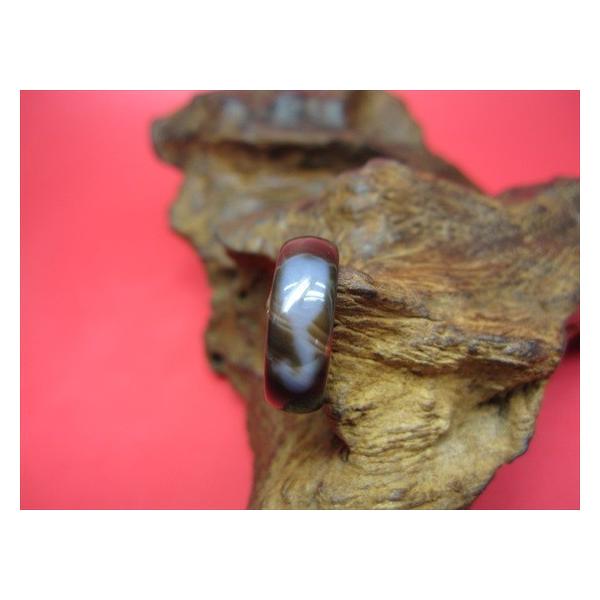 【チベット天珠指輪】☆商品情報☆幅：約7mm厚み：約2.6mmサイズ：約11号原産地：チベット※照明等の関係で実際の色とは多少イメージが異なる場合もありますのでご了承ください。※こちらは一点物となっておりますので、画像の商品のお届けとなりま...