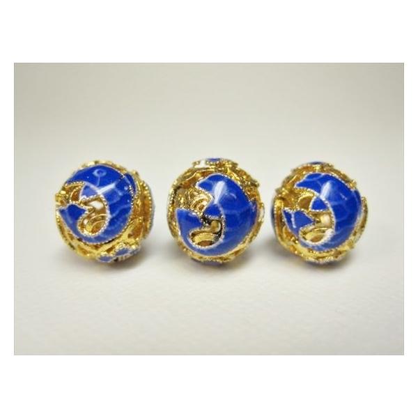 【粒売り】チベット七宝焼きビーズ縦：約10mm±.0.2mm直径：約Φ9.8±0.2mm穴サイズ：約Φ2mm金属部分材質：銅に金メッキ原産地：チベット※材質上、形状やサイズのばらつき、表面や穴周りにキズや凹み等があります。色味や模様等のご指...