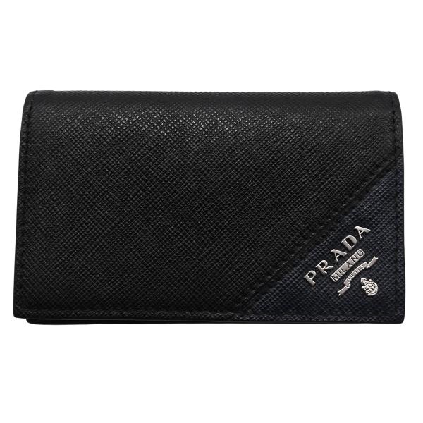 商品名 PRADA メタルロゴ カードケース 名刺入れ型番 2MC122素材 サフィアーノレザーカラー ブラック（黒）/ネイビー仕様 【開閉】スナップボタン式 【内部】ポケット×4サイズ 約W11cm×H7cm×D2cm定価 ￥-付属品 本...