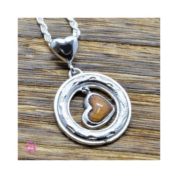 ハワイアンコアウッドハートサークルシルバー925ペンダント　ハワイアンジュエリー 送料無料 P11814100素材：シルバー925+ロジウムフィニッシュ+コアウッドサイズ：17ｘ17ｍｍバチカン含まずサークルのみのサイズ厚み：ハート2.6ｍ...