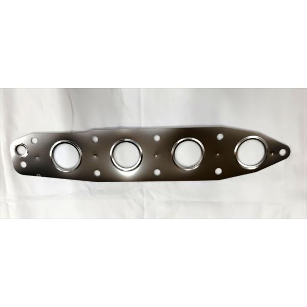 ジムニー 1300 ワイド1のガスケット エキゾーストマニホールド ※写真 No 2番車名：ジムニー 1300 ワイド1型式：JB33W様式：JB33W車台番号：100001〜999999開始年月：平成09年12月終了年月：平成12年03月...