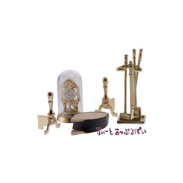 暖炉ツールのミニチュアです！ドームクロックも入って、このお値段ですよ！ただ、やはりロイターの商品に比べると、粗野な感じです。金色も鈍いですし、ふいごに至っては、蛇腹にもなっていません。かなり大雑把な感じ。でも、手軽でリーズナブルな物をお探し...