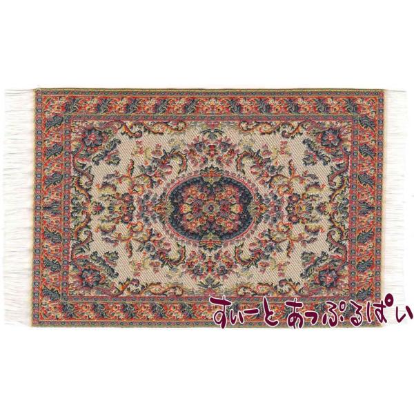 トルコ製のドールハウス用ミニチュアラグです。柄はプリントではなく、機械織りで表現されています。左右の端には、白いフリンジが付いています。大きさは100ｘ150ｍｍです（両端のフリンジの部分含まず）。厚みは意外にありませんので、コースターなど...