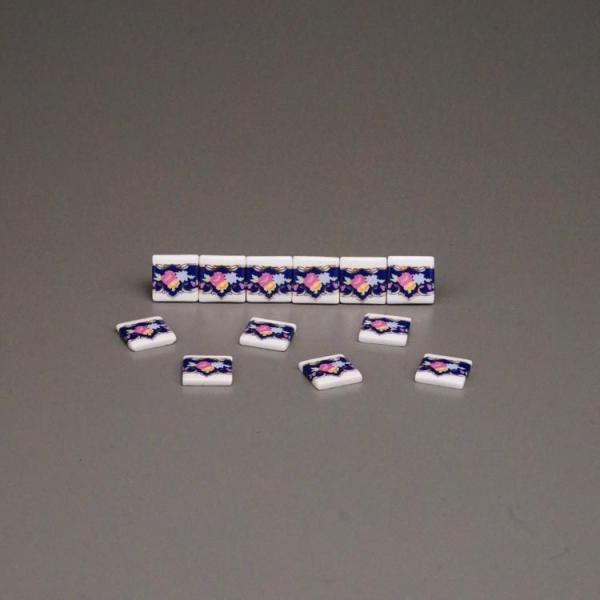 陶器製のタイル12枚セットです！下写真のように、ロイター社の暖炉などをデコレーションすることができます。もちろん、他のことに使ってもＯＫですよ！タイル一枚のサイズ：13ｘ13ｍｍ、厚み約2ｍｍ