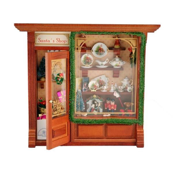 ドイツロイター社製のミニチュアです。クリスマスの楽しげな雰囲気が良く表現されていますね。電池式の照明をつけても良さそうですよ。とてもきれいで、プレゼントや自分へのご褒美にぜひいかがでしょうか！サイズ：W235xD80xＨ210ｍｍ。※扉は開...