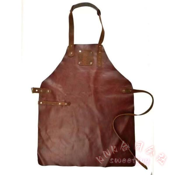 PUレザー：当社のエプロンはPUレザーで作られています。防汚、防油、防水、お手入れが簡単なクロスキャンバスストラップ。レザーとメタルリングで作られた調節可能なクロスバックストラップ付き。耐熱性：PUリネンや綿よりも優れており、革は耐熱性があ...