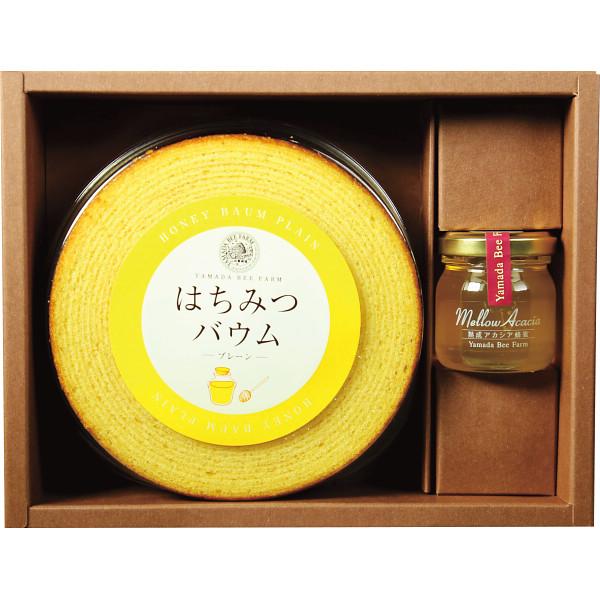 はちみつを使い、職人により一層一層丹念に焼き上げたバウムクーヘンに、はちみつをかけて食べるスイーツギフトです。はちみつを使ったお菓子に、はちみつをかけて食べる、山田養蜂場ならではのギフトセットです。商品：はちみつバウム×１、アカシア蜂蜜（ル...