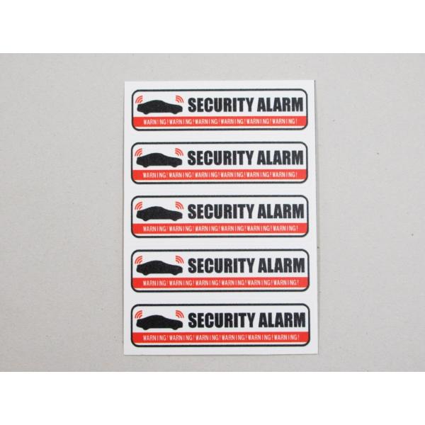 カーセキュリティシール　SECURITY ALARM セキュリティアラーム シール・ステッカー 白色5枚(1セット)です。シール・ステッカータイプなので簡単に設置、取り外し可能です。車体や窓に貼り付けて、駐車中の車上荒らしや盗難・いたずらへ...