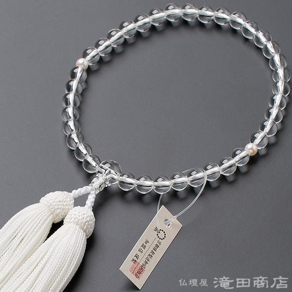 珠の素材：本水晶 7mm玉　　　　　2天珠に本真珠を使用房の素材：正絹頭付房（灰白色）備考：数珠袋付き、数珠は桐箱入りすべての宗派でお使いいただける女性用の念珠です。本水晶の7mm玉を使用し、2天珠に本真珠を使用しました。正絹の頭付房がつい...