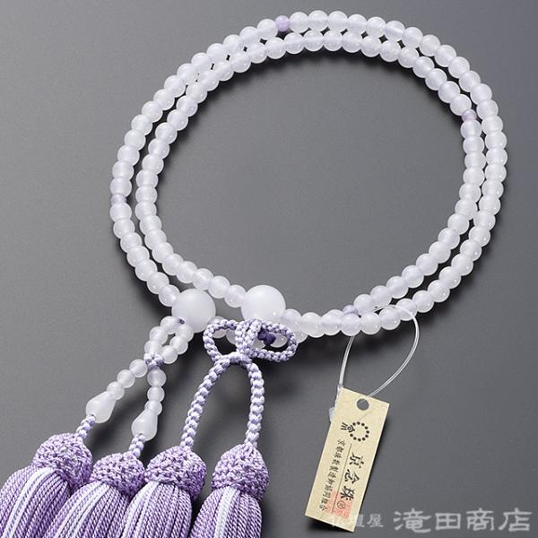 珠の数：主珠108個珠の素材：白オニキス　　　　　四天珠に紫雲石を使用房の素材：正絹頭付房（藤色/白色）サイズ：8寸サイズ宗派：浄土真宗の本式数珠備考：数珠袋付き　　　数珠は桐箱入り浄土真宗用の正式な女性用の念珠です。白オニキスの5mm玉を...