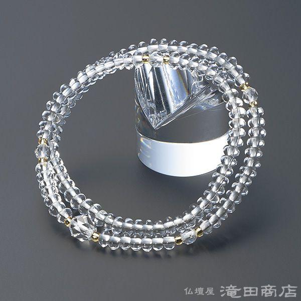 珠の素材：本水晶 みかん玉 主珠108個　　　　　親珠・四天珠にカット本水晶を使用中糸の素材：オペロンゴム（シリコンゴム）サイズ：内周 約16.5cm〜約17.5cm宗派：すべての宗派でお使いいただけます備考：携帯用ポーチ袋付き本式数珠と同...
