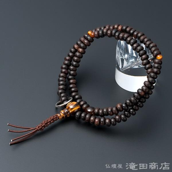 珠の素材：縞黒檀（艶消） 主珠108個　　　　　親珠・四天珠に虎目石を使用中糸の素材：オペロンゴム（シリコンゴム）サイズ：内周 約16.5cm〜約18cm　　　　※サイズ変更不可宗派：曹洞宗の本式数珠ブレスレット備考：携帯用ポーチ袋付き曹洞...