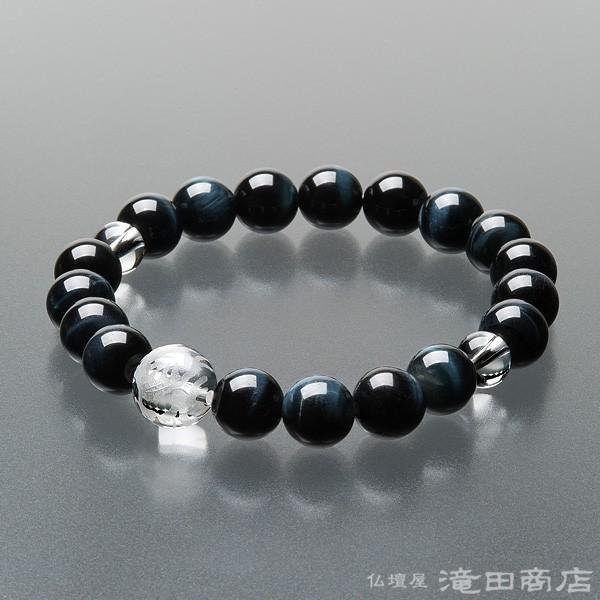珠の素材：青虎目石 10mm玉　　　　　親玉に龍彫り本水晶を使用中糸の素材：オペロンゴム（シリコンゴム）サイズ：下記のサイズよりお選び下さい　　　　・内周 約17cm　　　　・内周 約18cm備考：携帯用ポーチ袋付き天然石の腕輪念珠（ブレス...