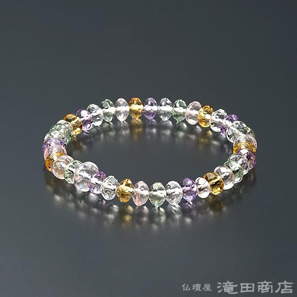 珠の素材：ミックスクオーツ スターシェイプカット玉 7mm×5mm玉中糸の素材：オペロンゴム（シリコンゴム）サイズ：内周 約16cm備考：携帯用ポーチ袋付き天然石の腕輪念珠（ブレスレット）です。ミックスクオーツ スターシェイプカット玉の7m...